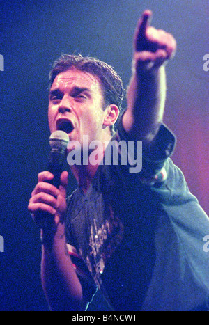 Robbie Williams on stage at the SECC in concert October 2000 Stock ...