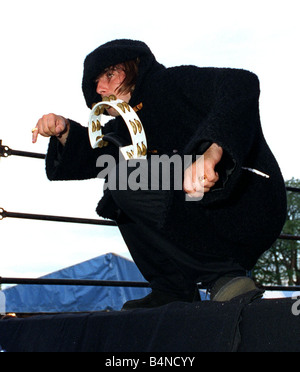 Liam Gallagher playing the tambourine during the Oasis concert at ...