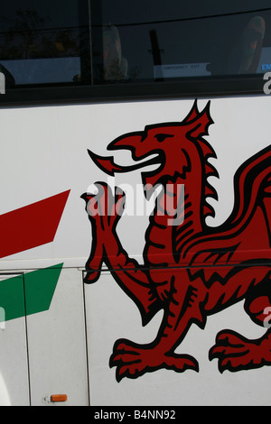 welsh dragon on side of bus window in wales Stock Photo - Alamy