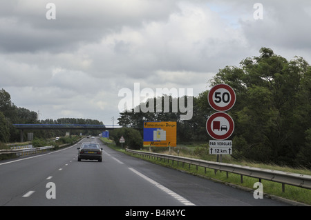 French autoroute motorway speed limit sign showing weather restrictions ...