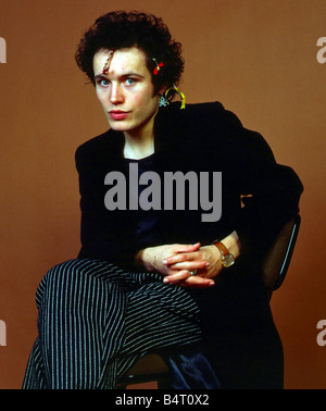 Adam Ant the 1980s British pop singer leans against tree Stuart Goddard ...