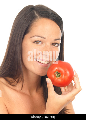 Young Woman Holding Beef Tomato Model Released Stock Photo - Alamy
