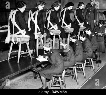 World War II Women. A parachute packing class in progress, with the ...