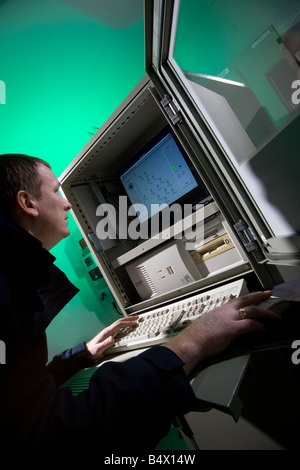 Computerised wind farm control room interior with controller showing ...