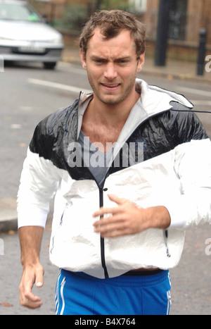 Jude Law jogging near his home in Maida Vale West London Stock Photo ...