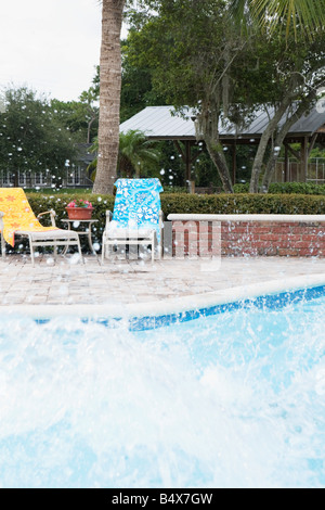Big water splash in Pool Stock Photo - Alamy