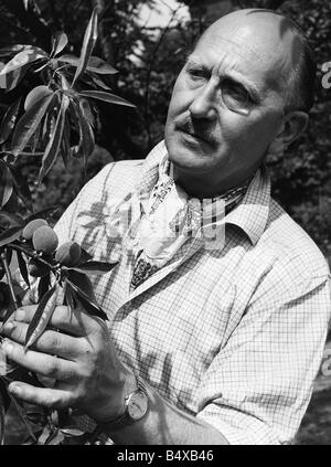 John Craddock husband of Fanny in kitchen tossing salad Stock Photo - Alamy
