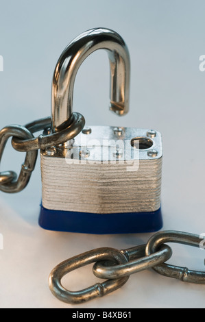 Image of a broken lock with a white background Stock Photo - Alamy