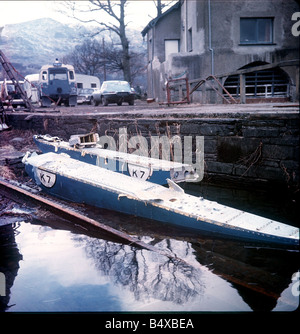 Donald Campbell in Bluebird speedboat at Ullswater stands in craft ...