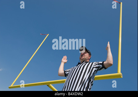 Football referee calling field goal Stock Photo - Alamy