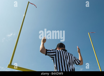 Football referee calling field goal Stock Photo - Alamy