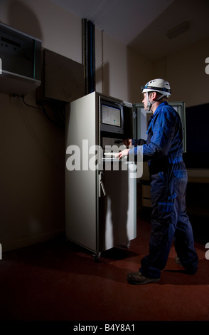 Computerised wind farm control room interior with controller showing ...