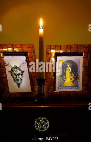 Wiccan Altar with candle god and goddess images and pentagram chalice ...