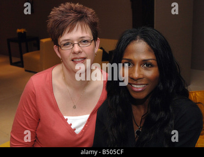 Ex Pop star Sinitta and husband Andy Willner pictured with surrogate ...