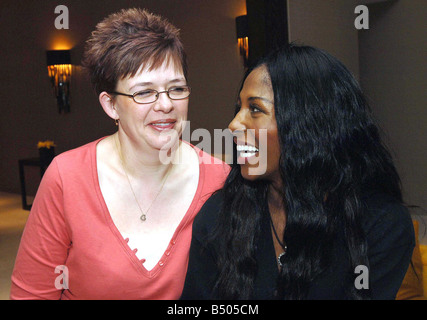 Ex Pop star Sinitta and husband Andy Willner pictured with surrogate ...