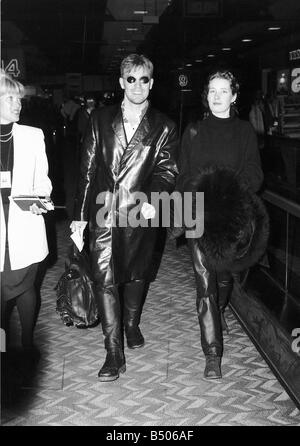 Jason Donovan Actor and Singer with girlfriend Danielle Gaha Stock ...