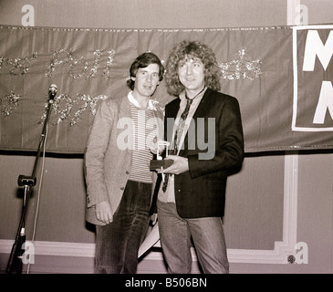 Monty Python s Michael Palin seen here with Led Zeppelin s Robert Plant ...