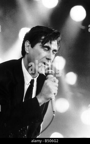 Bryan Ferry Singer with Pop Group Roxy Music singing on stage wearing ...