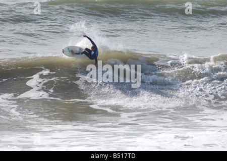 Surfer taking part in the Welsh surfing championships Porthcawl Mid ...