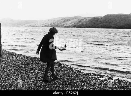 Tonia Bern, the wife of Donald Campbell, stands along at the edge of ...