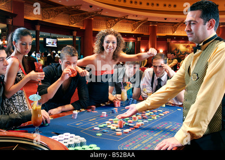 Live casino happy gamblers betting roulette wheel dolly chip currency ...