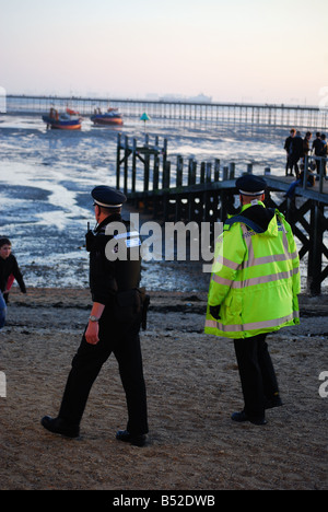 Police officers patrolling on Southend Pier in the Thames Estuary off ...