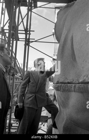 Sculptor Chas Wheeler overseeing the installation of his work "Miss ...