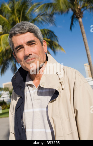 Cuban man posing in front of his handmade large format camera in ...