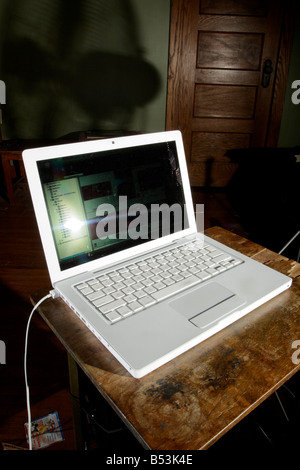 White MacBook laptop computer, left side Stock Photo - Alamy