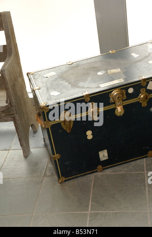 Old trunk with travel stickers Stock Photo - Alamy