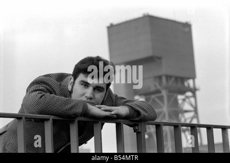 A coal miner before the huge Bevercotes Colliery. Time office of the ...