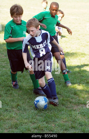 11 year old boys soccer action Stock Photo - Alamy