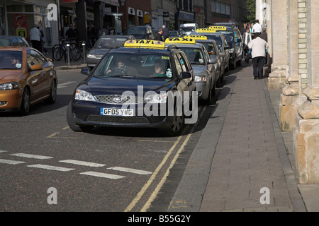 Line of taxis Bury St Edmunds Suffolk England Stock Photo - Alamy