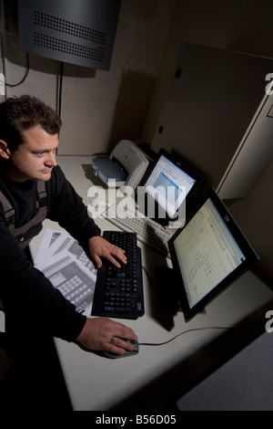 Computerised wind farm control room interior with controller showing ...