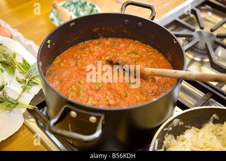 Pasta sauce cooking in a saucepan Stock Photo - Alamy