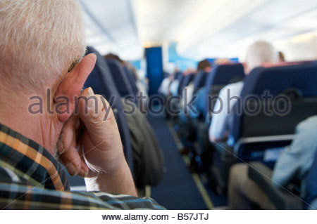 Airplane, man, middle old person, sit, sleep inside, fly, travel Stock ...