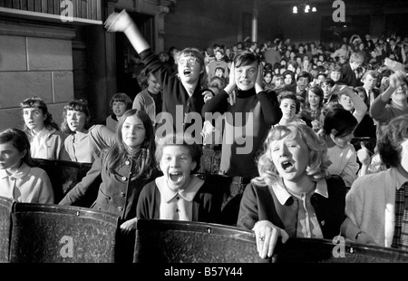Fans screaming during a Beatles concert in their hometown of Liverpool ...