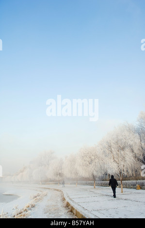 People cool off in a river as the National Weather forecaster issued an ...