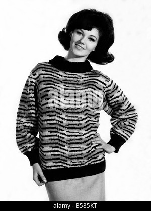 Reveille Fashions: Meriel Weston. wearing a floral pattern one pice ...