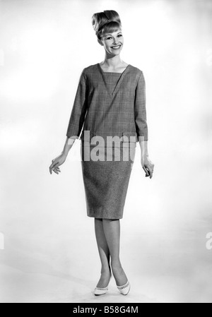 Reveille Fashions 1964: Jo Waring wearing a bowling suit of slacks and ...
