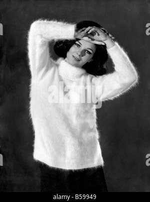 Reveille Fashions: Meriel Weston. wearing a floral pattern one pice ...