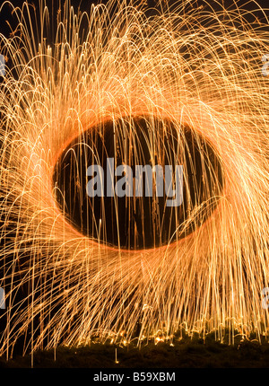 Catherine wheel firework spinning Stock Photo - Alamy