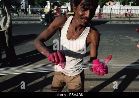 Kite string production, string is coated in ground glass for fighting ...