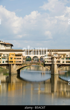 The Ponte Vecchio over the Arno River in Florence in Tuscany, Italy ...