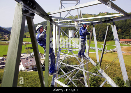 Workers maintaining the transmission line Stock Photo - Alamy