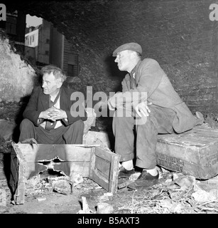 Tramps: Two homeless gentlemen who live in the cellar of a bombed out ...