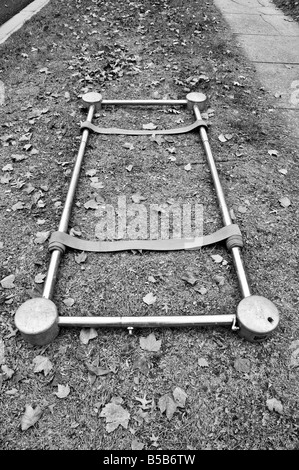 a well used casket lowering device on the ground at Pinelawn Memorial ...