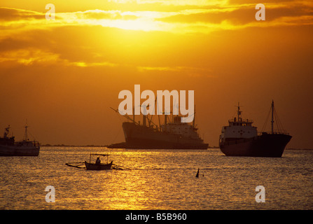Cargo ships in the Bay of Manila. Large container ship in the sea, blue ...