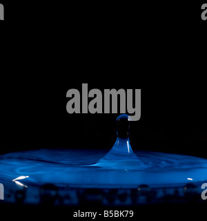 Water splash or drop. Water splash close-up. Blue water drop. Falling ...