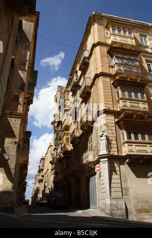 A vertical shot of a narrow street with buildings in Morcone in the ...